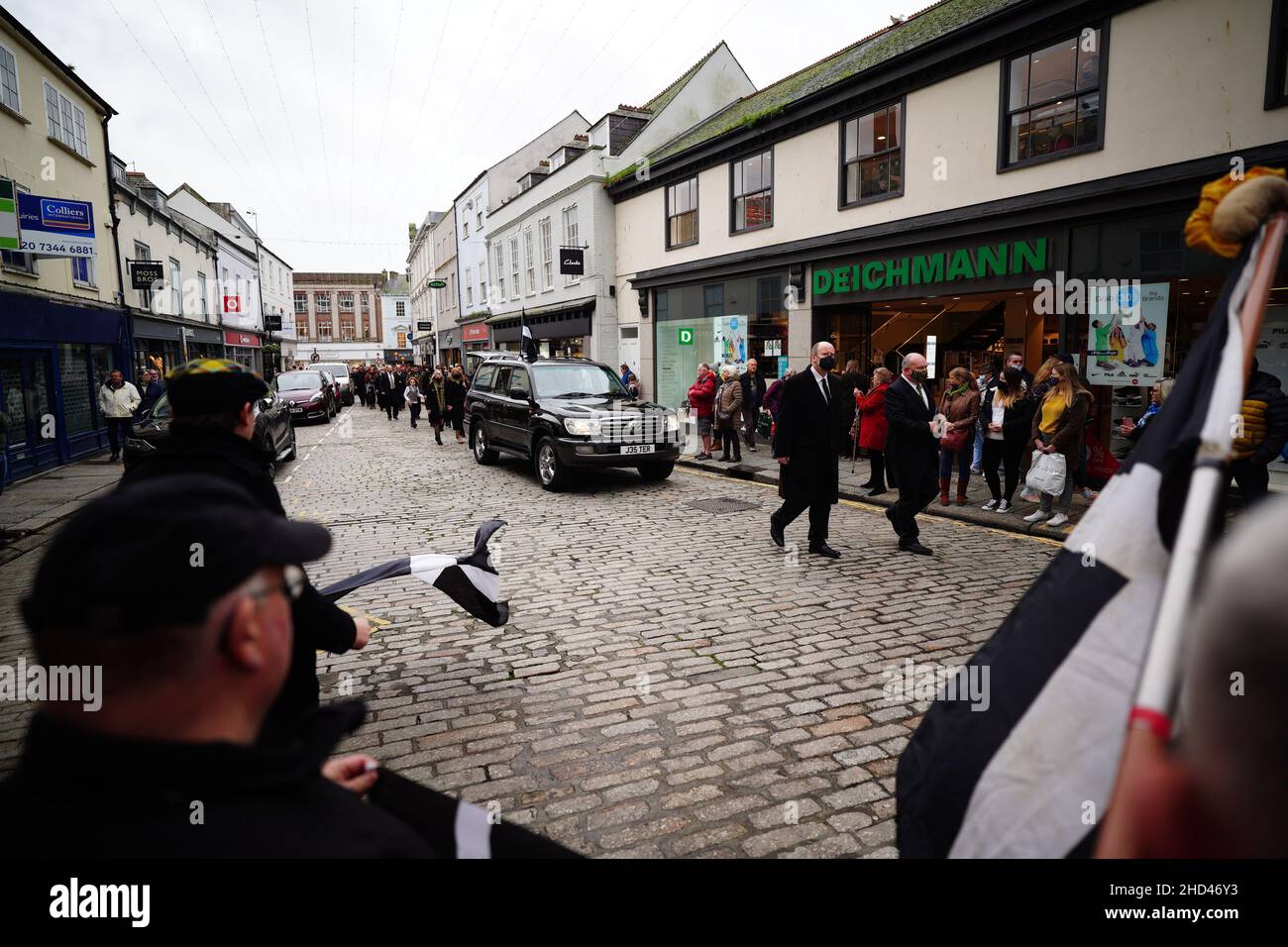 The funeral cortege leads the mourners as they arrive for the funeral ...