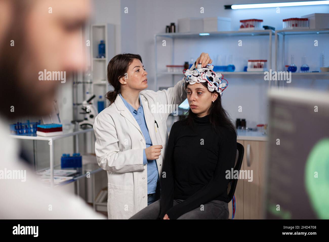 Adjusting tech lab coat hi-res stock photography and images - Alamy