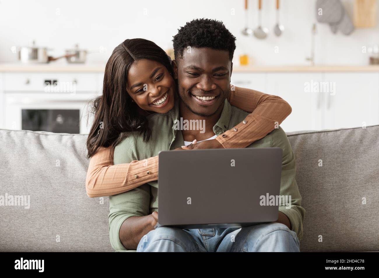 Closeup of african american family using computer at home Stock Photo ...