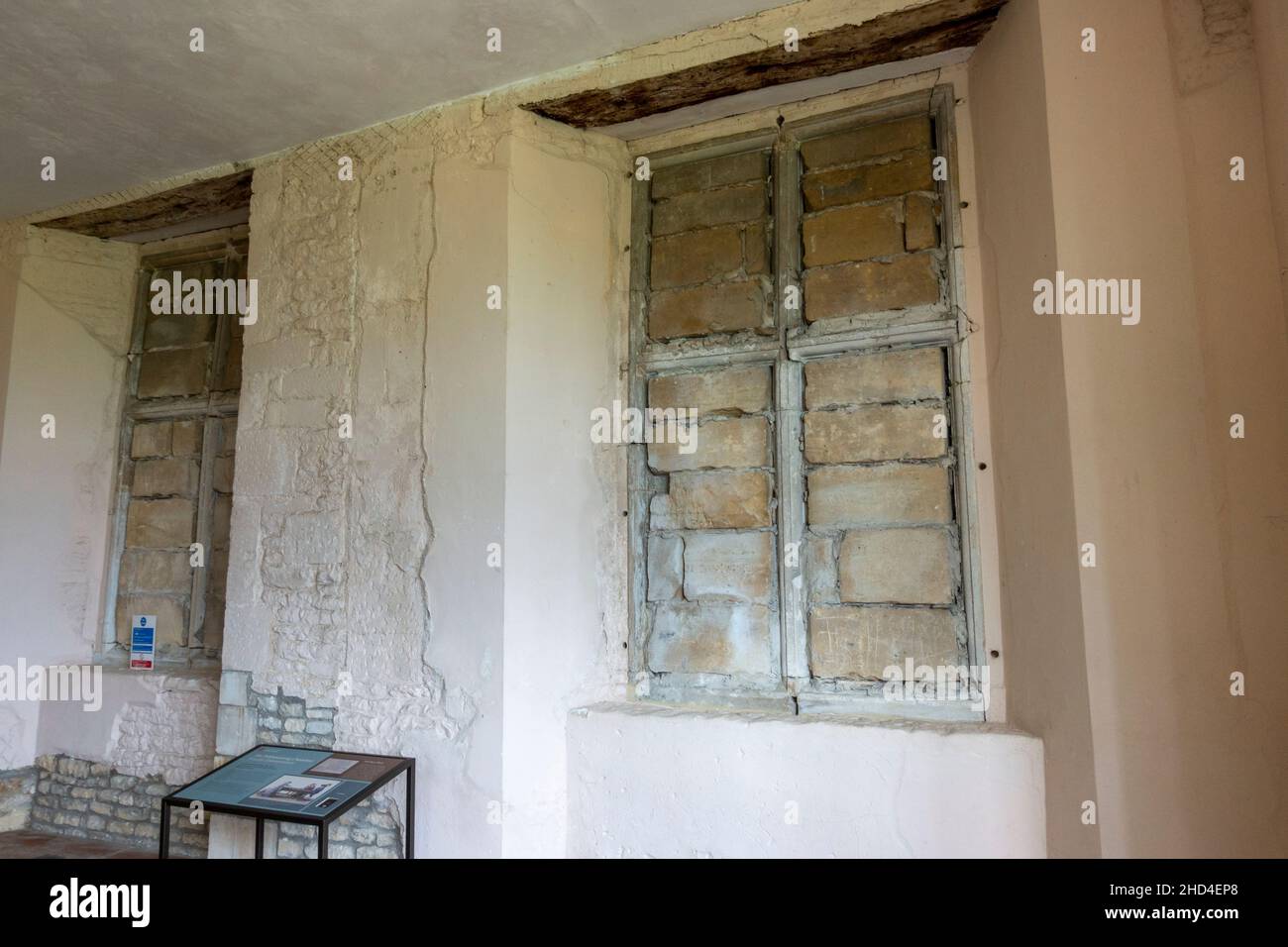 Inside view of bricked up windows in the ruins of Kirby Hall, an ...