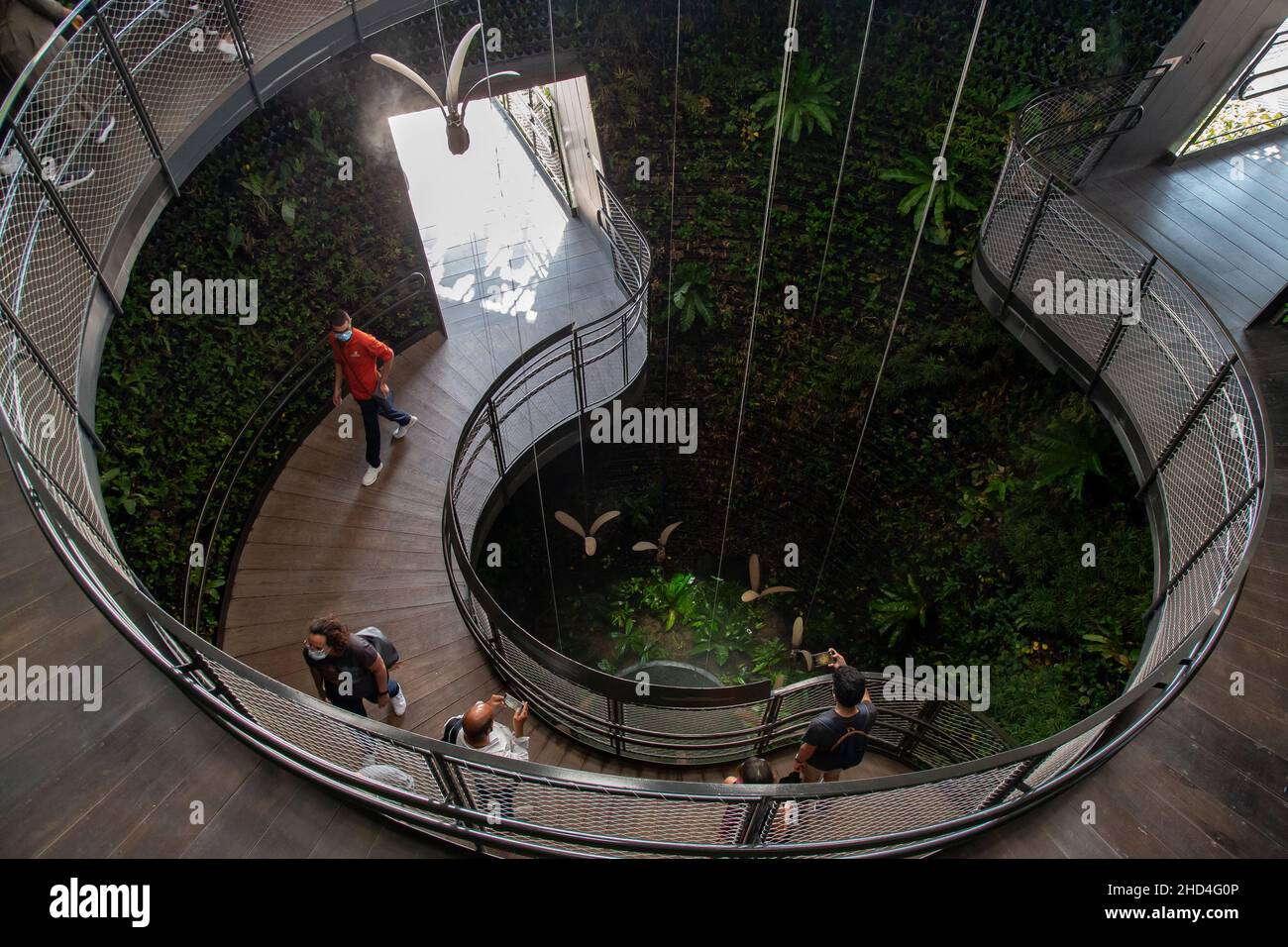 Beautiful shot of the Singapore pavilion with visitors people vertical ...