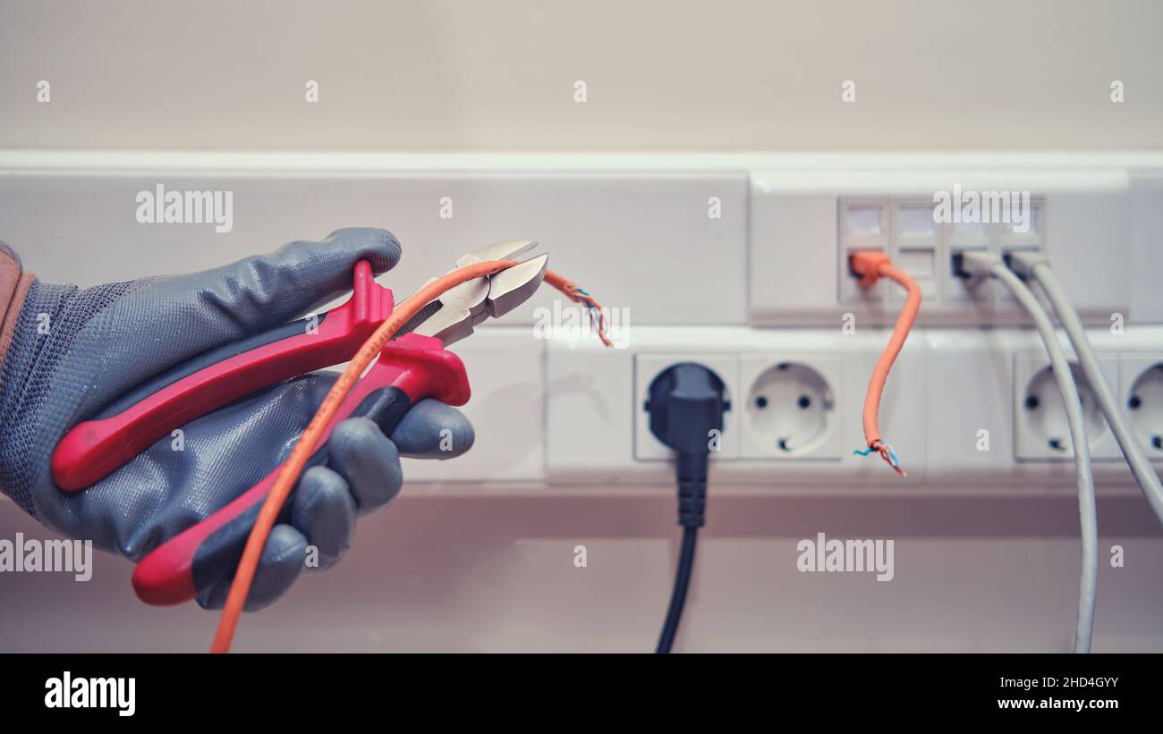 Cutting the computer network wire in the office in pieces Stock Photo ...