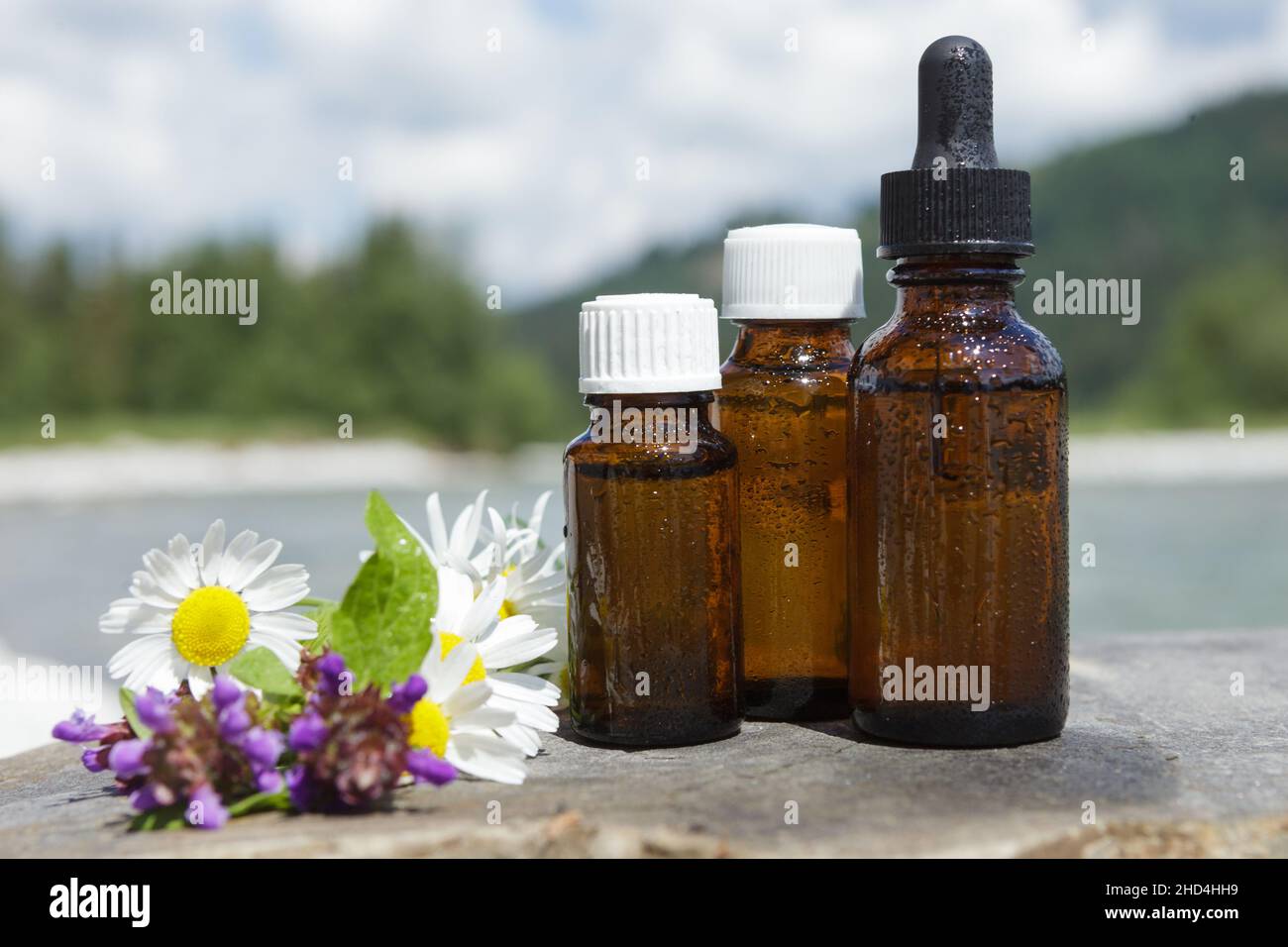 Group amber medical bottles against background of water. Bottles on ...