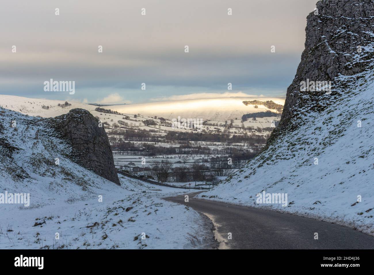 Winter view of snow covered Winnats Pass. Peak District, Debyshire, UK ...