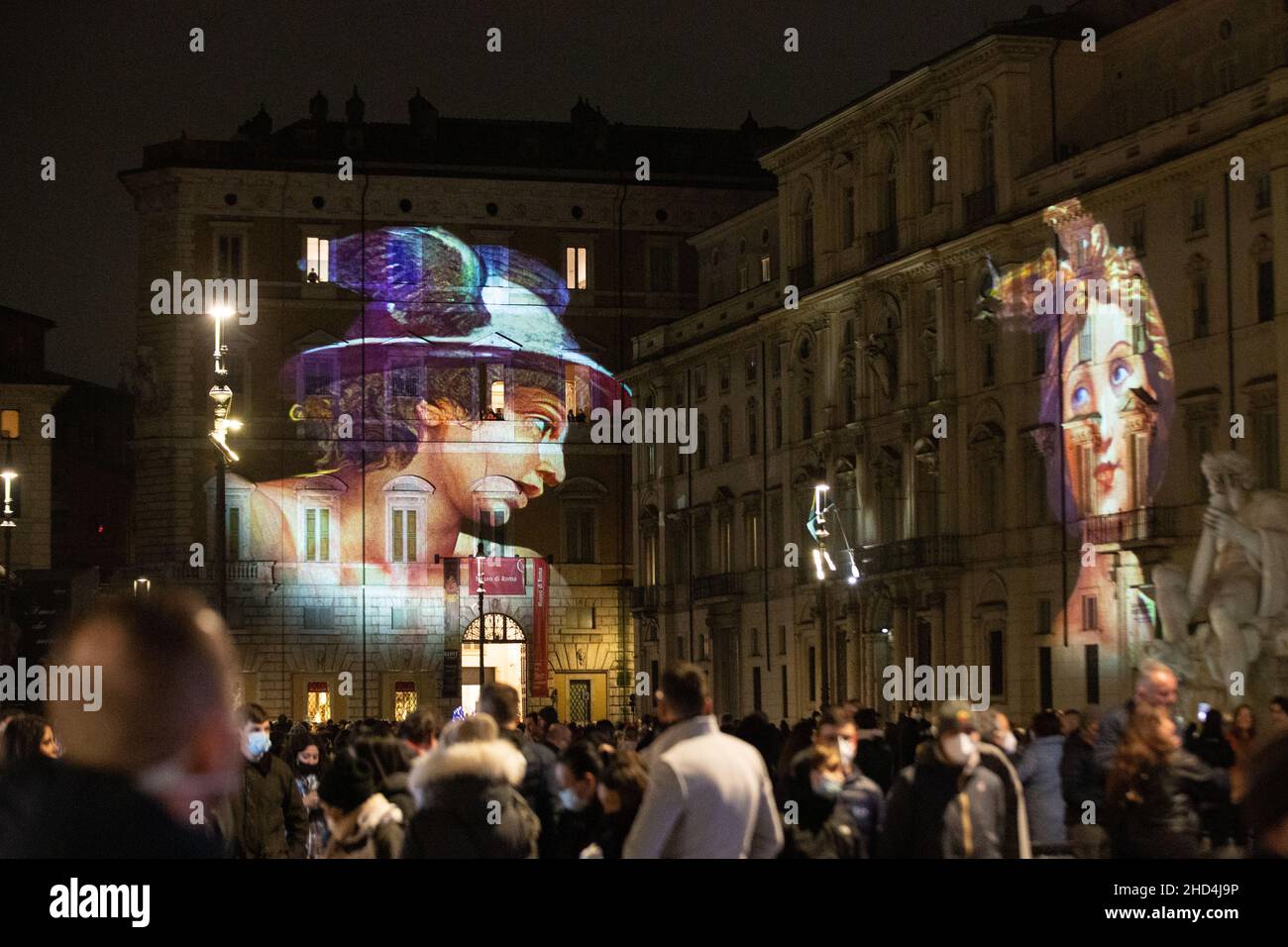 Detail of artistic projections, depicting pictorial masterpieces of Renaissance, in Piazza ...