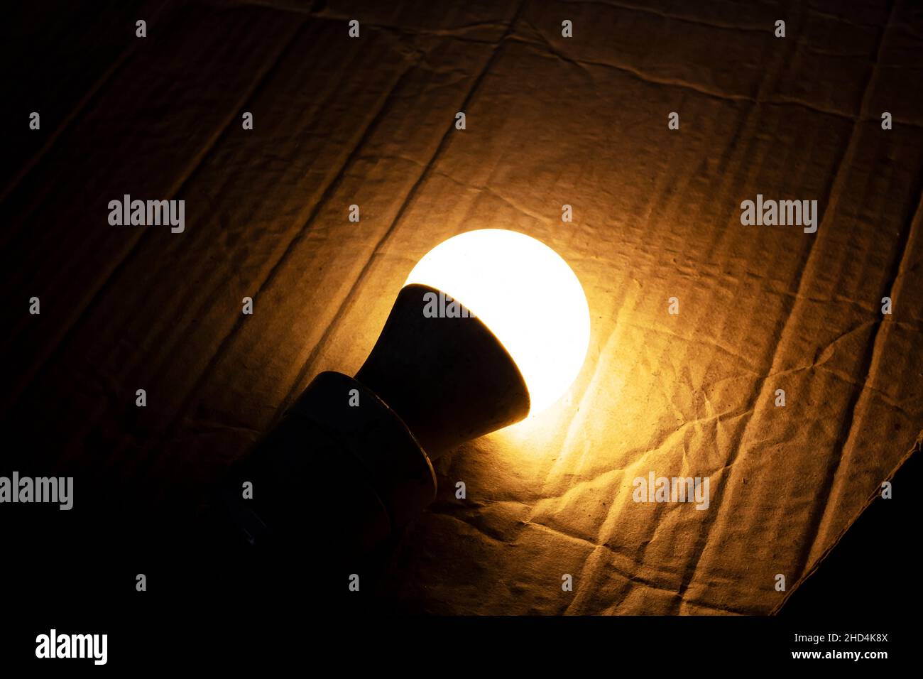 Light bulb filament close up lit up hi-res stock photography and images ...