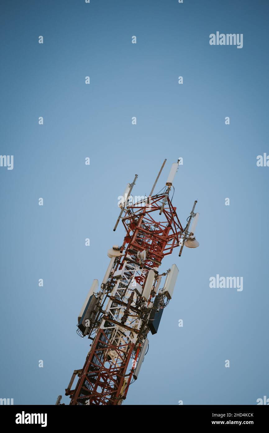 Low angle shot of the electrical high tower with the sky Stock Photo ...