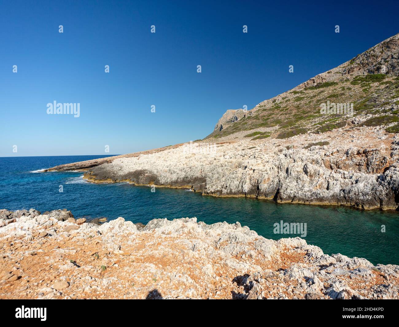 View of a river canal flowing through rocky mountains of the Katholiko ...