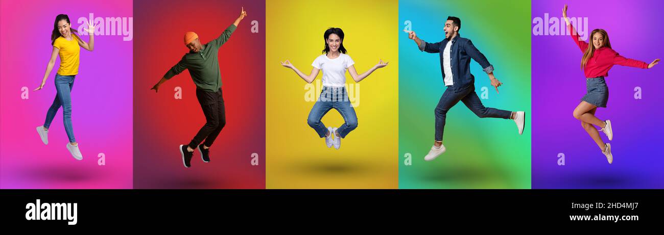 Interracial young people in casual clothes jumping and having fun on ...