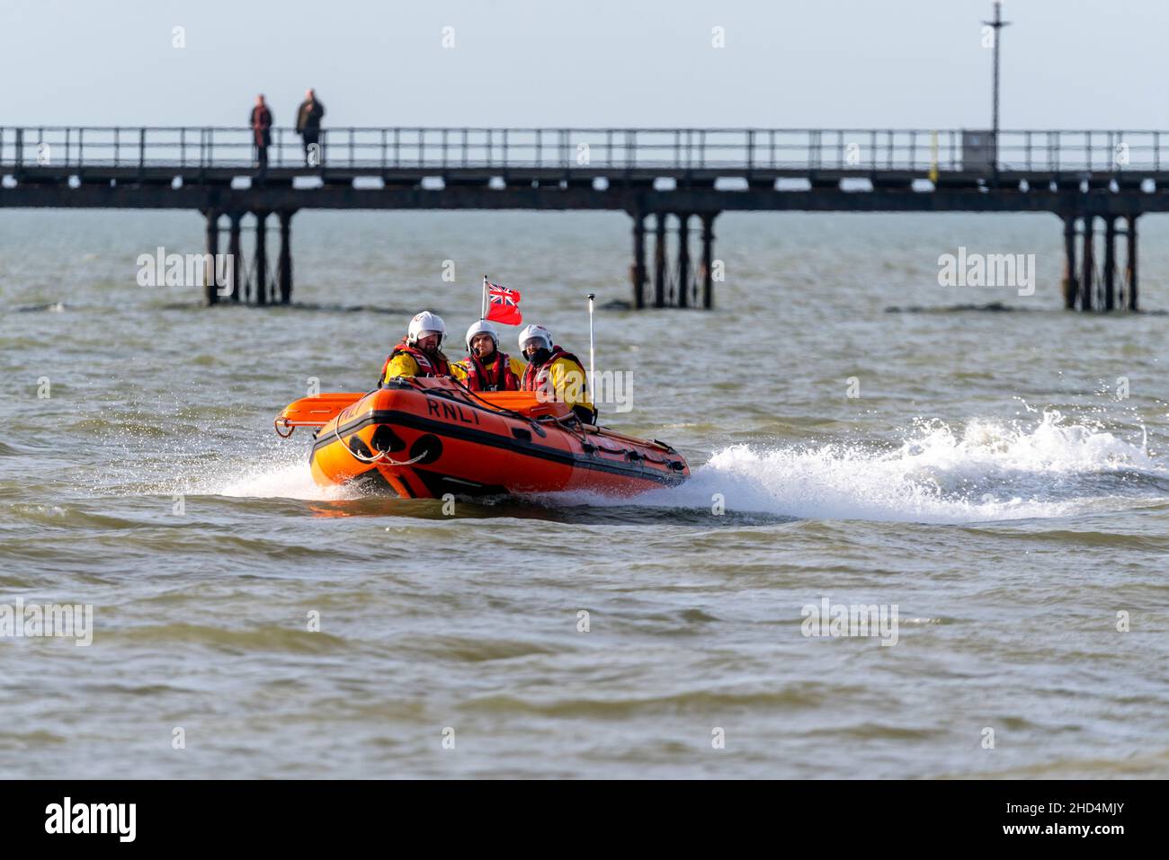 RNLI lifeboat as safety for swimmers in the sea of the Thames Estuary ...