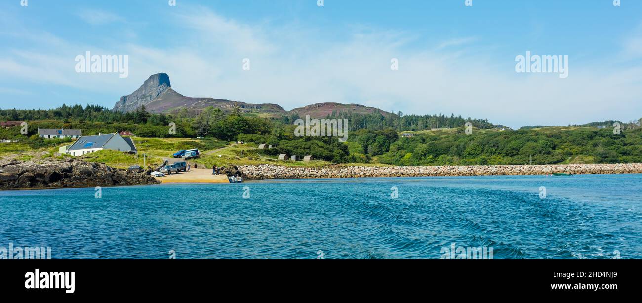 Isle of Eigg in Summer. A panoramic view of the Isle of Eigg taken from ...