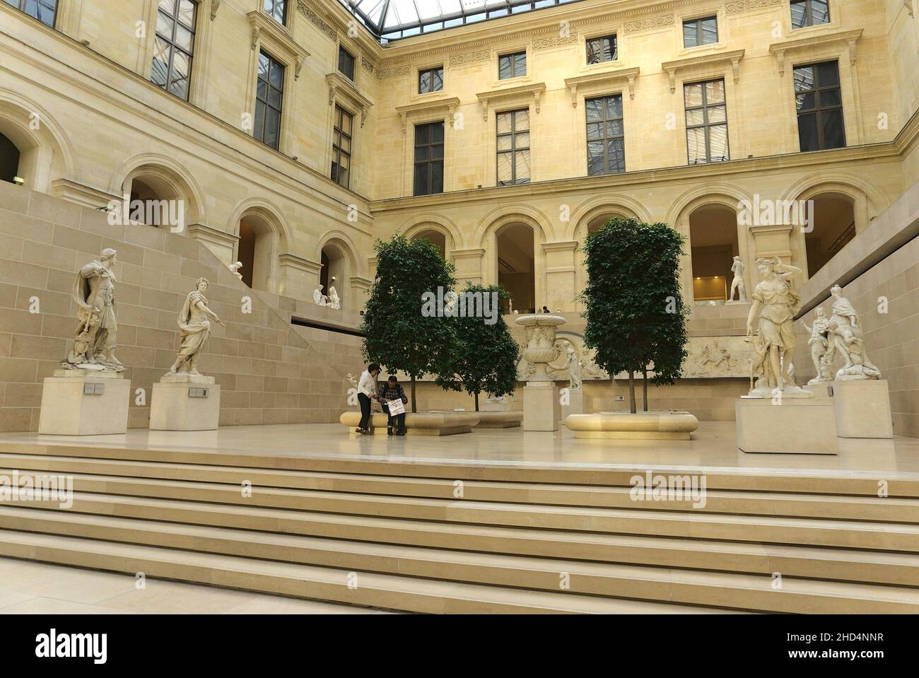 Sculptures in the Cour Marly glass-roofed courtyard inside the Louvre ...