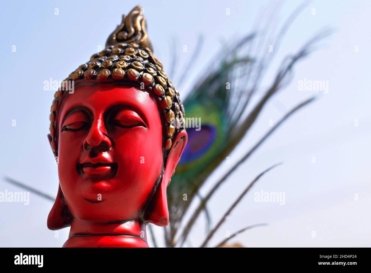 Beautiful red color face sculpture or statue of lord buddha, head of ...
