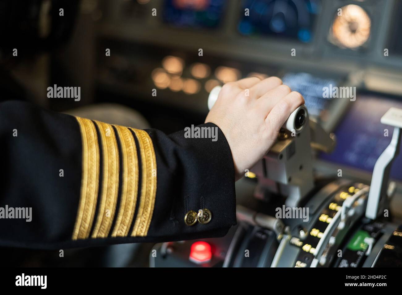 Female pilot's hand on the plane engine control stick Stock Photo - Alamy
