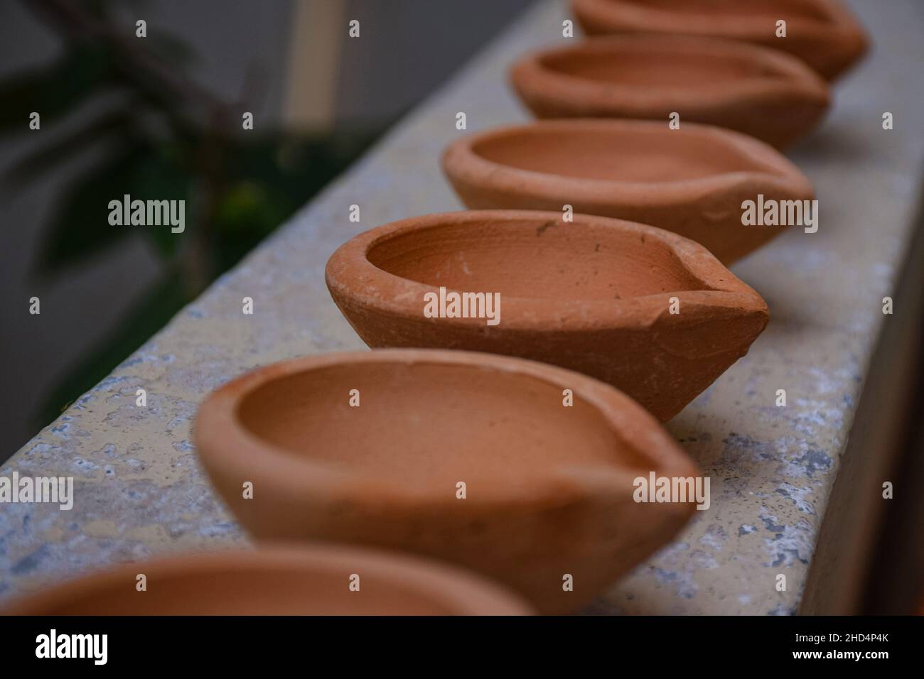 Stock photo of beautiful simple handmade traditional clay oil lamp ...