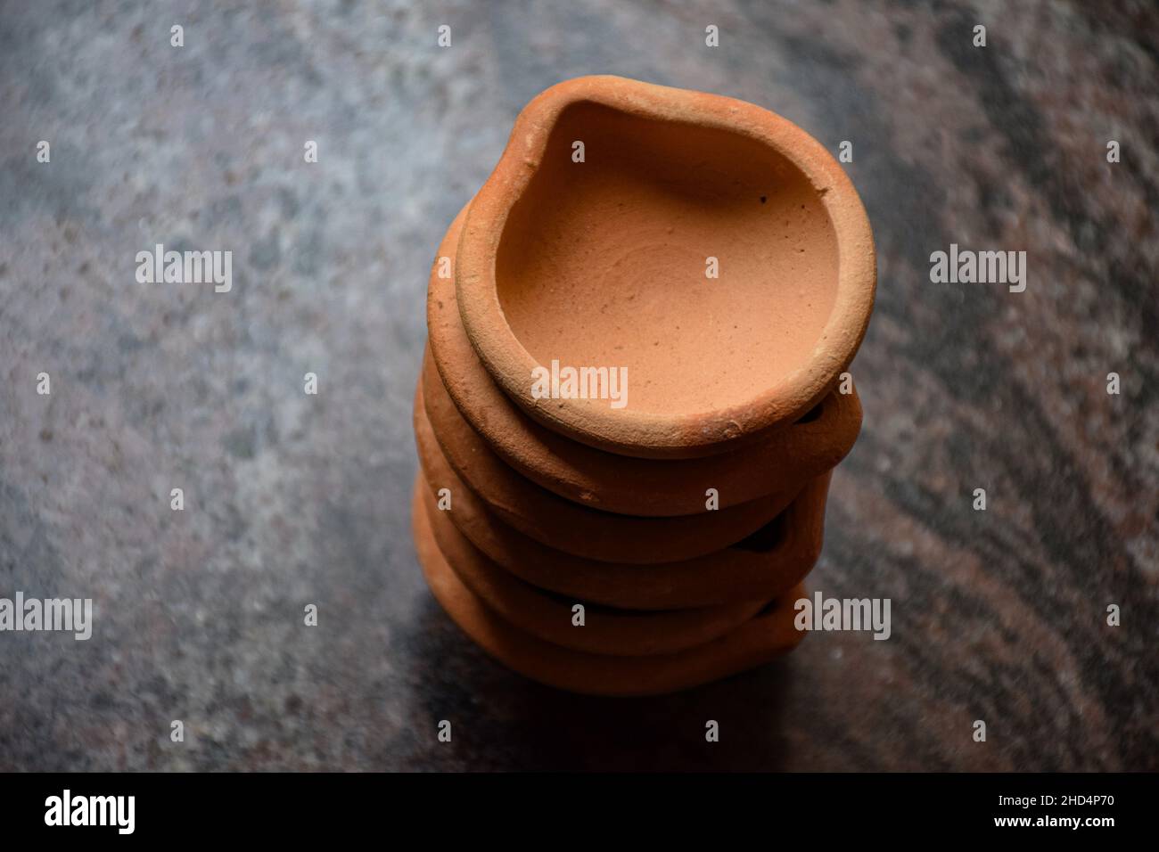 Stock photo of beautiful simple handmade traditional clay oil lamp ...