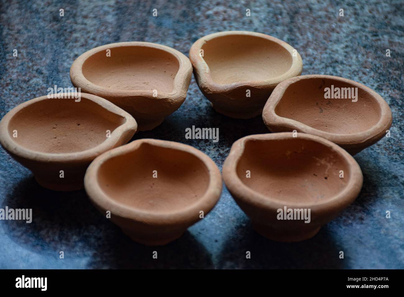 Stock photo of beautiful simple handmade traditional clay oil lamp ...