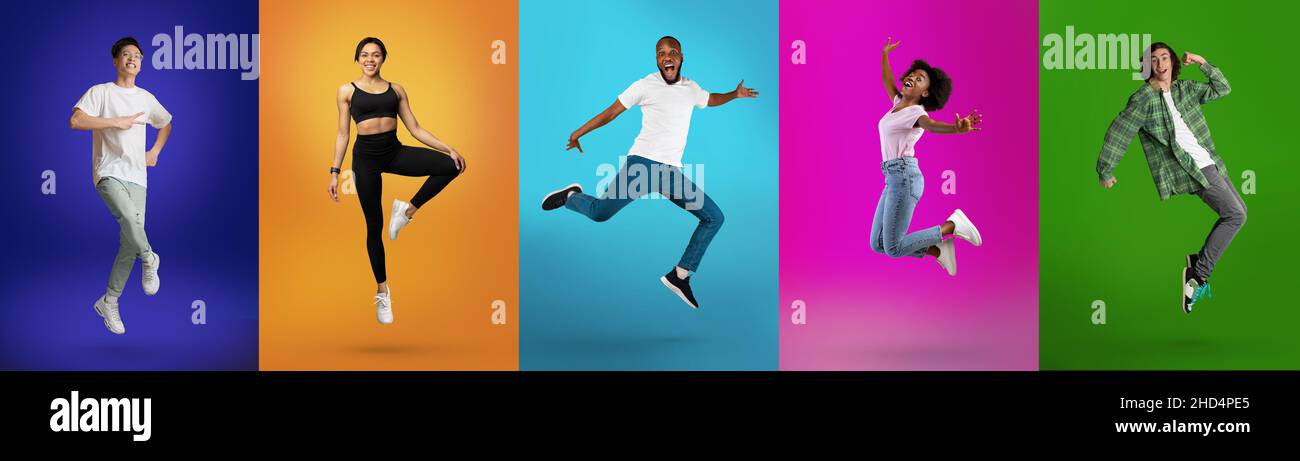 Having fun. Full length of happy multinational millennials jumping up ...