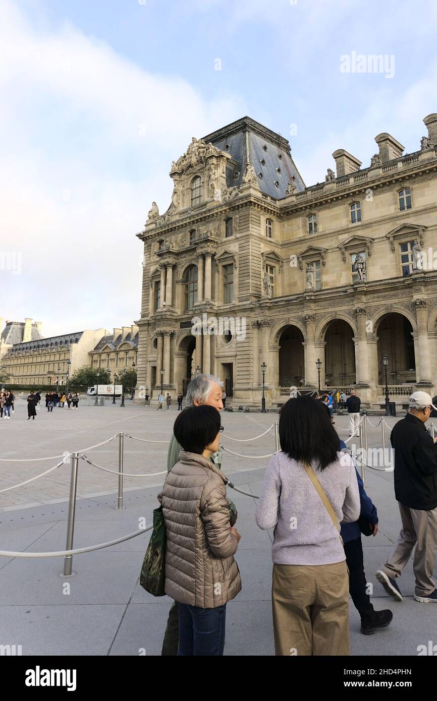 Vertical shot of the outside of the Louvre Museum at Paris in France ...