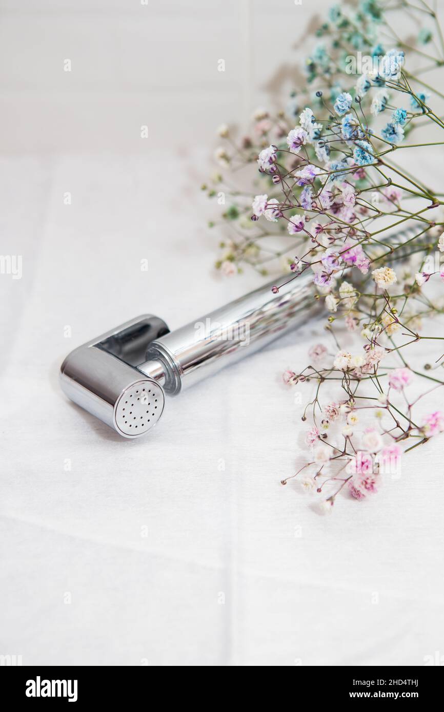 Hygiene and cleanliness concept. New hygienic chrome-plated shower in ...