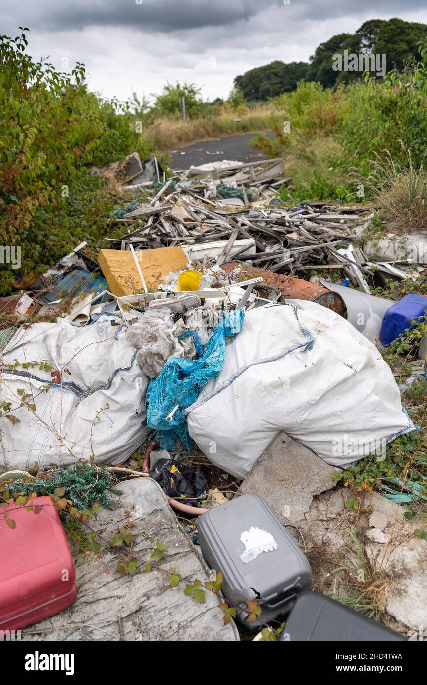Fly tipping in a rural layby. North Yorkshire, UK Stock Photo - Alamy