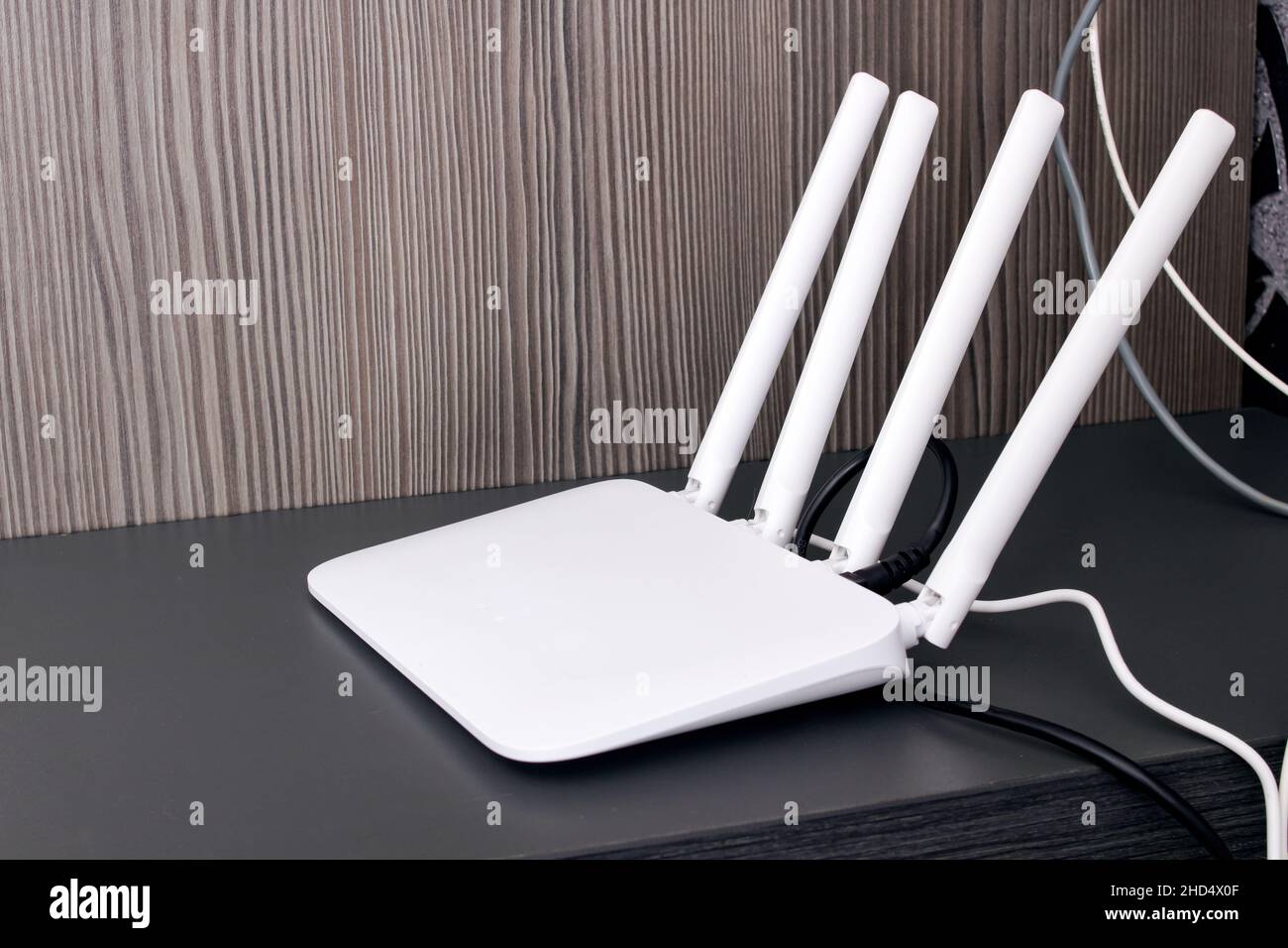 White modem with antennas on the table close up Stock Photo - Alamy
