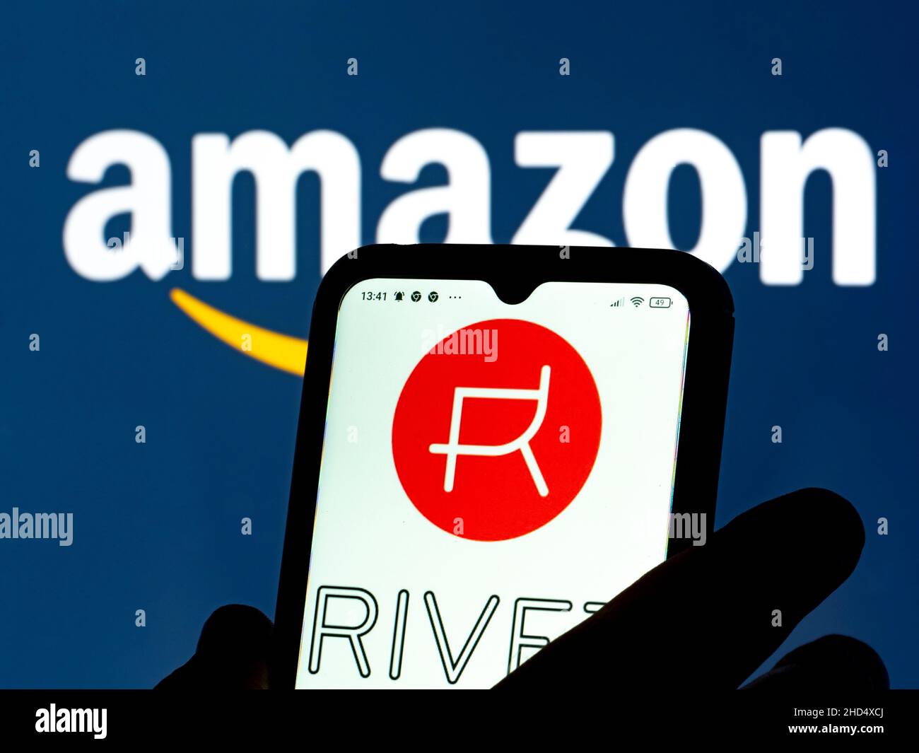 In this photo illustration Rivet brand owned by Amazon logo seen ...