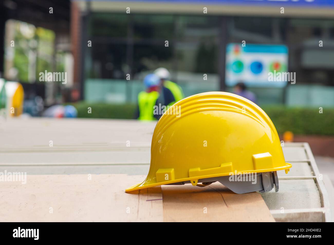 Yellow helmet on site construction background, Safety hardhat , Hard ...