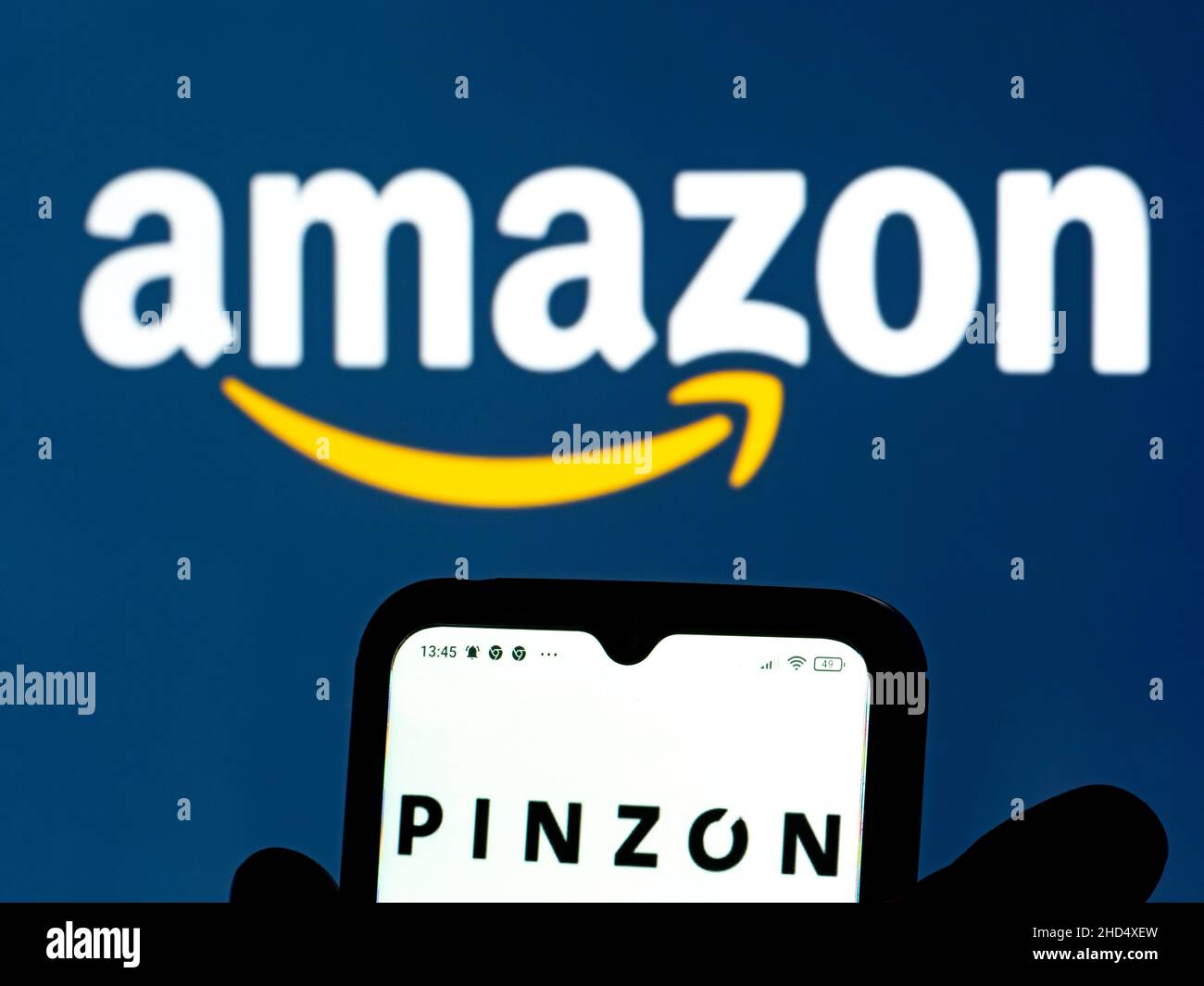In this photo illustration Pinzon brand owned by Amazon logo seen ...