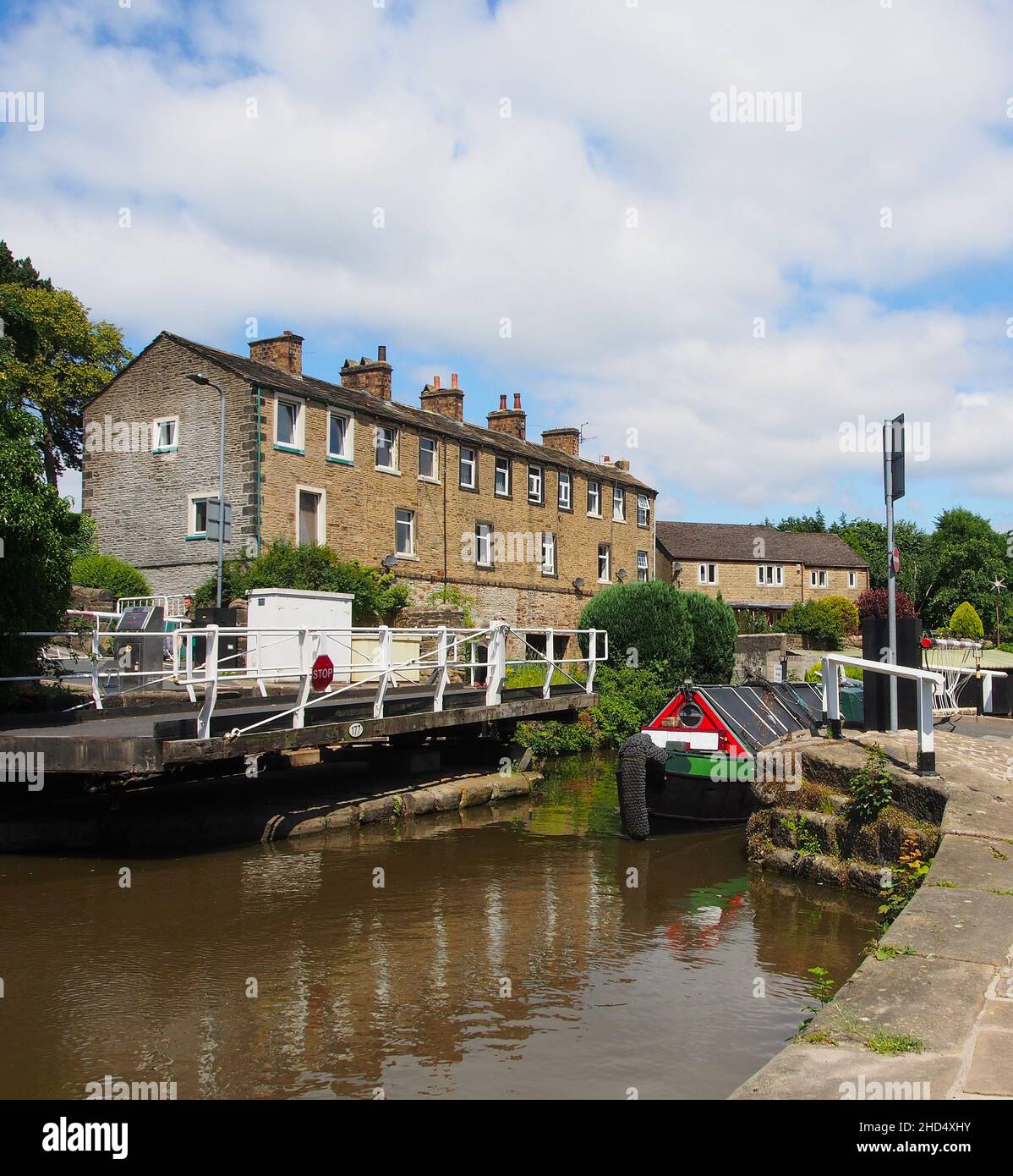 Cargo barge coming through the swing bridge on the Thanet Canal or ...
