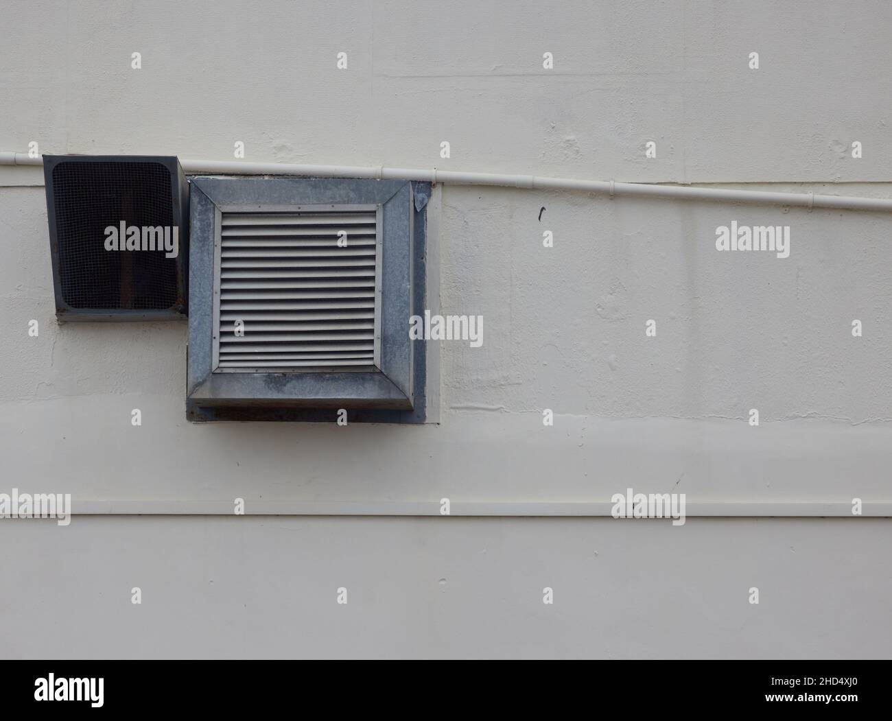 Detail of a vent on the side of a building Stock Photo - Alamy