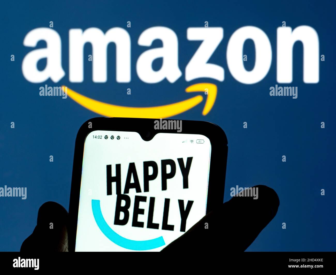 In this photo illustration Happy Belly brand owned by Amazon logo seen ...