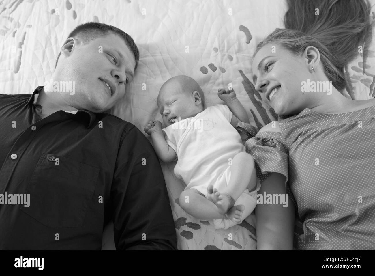 Portrait of attractive cheerful life partners daddy mommy cute baby ...