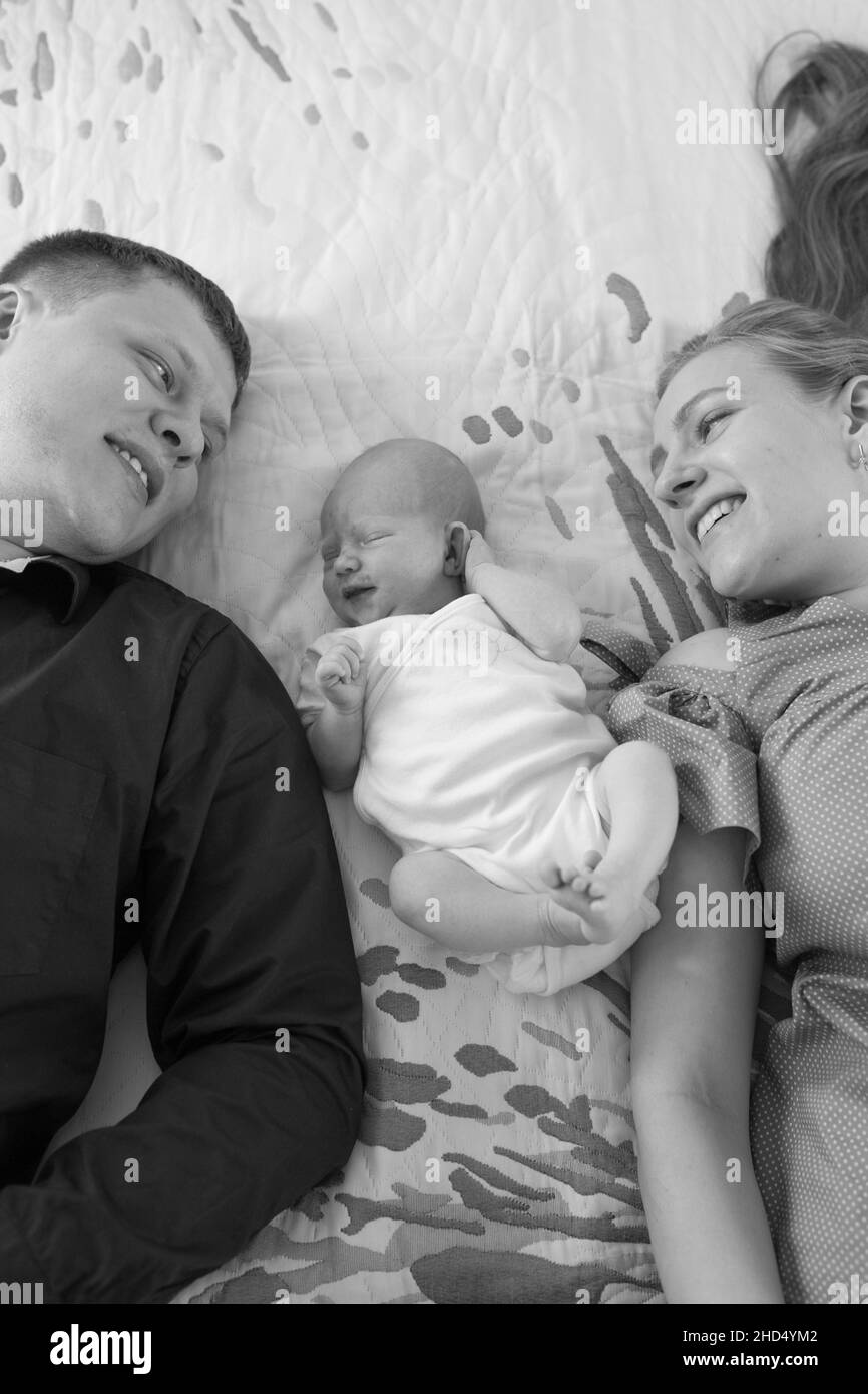 Portrait of attractive cheerful life partners daddy mommy cute baby ...