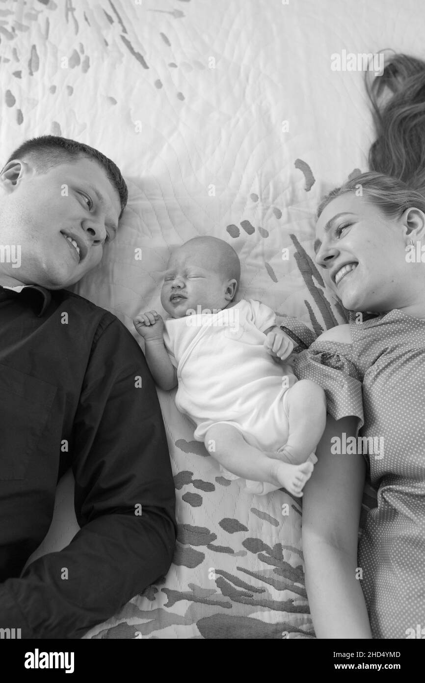 Portrait of attractive cheerful life partners daddy mommy cute baby ...