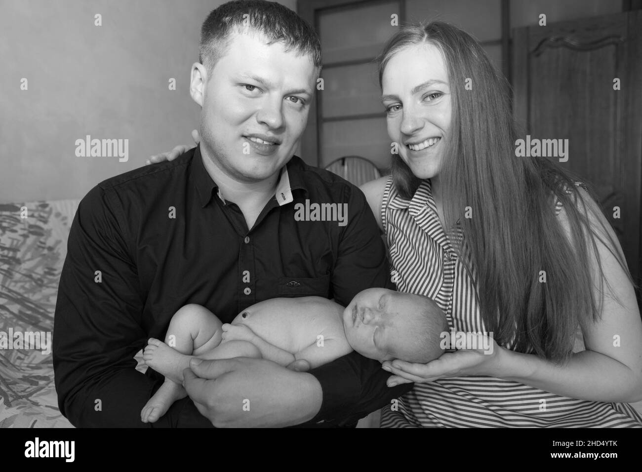 Portrait of attractive cheerful life partners daddy mommy cute baby ...