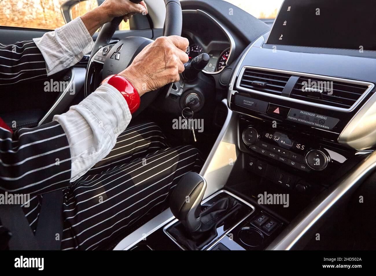 Stylish aged woman driving a expensive car Stock Photo - Alamy