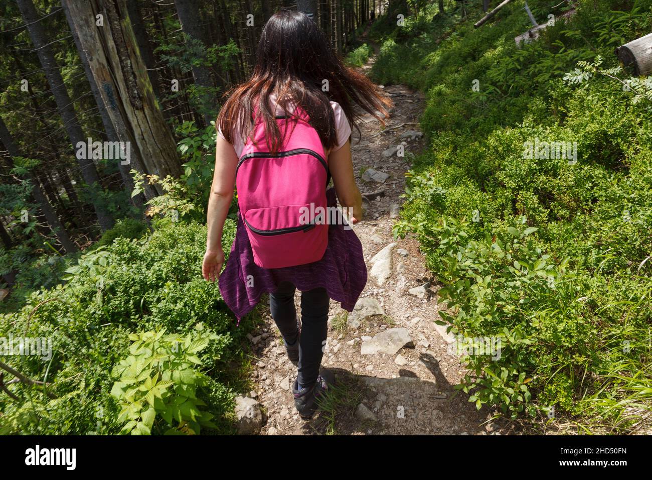 Rear shot girl backpack hiking hi-res stock photography and images - Alamy