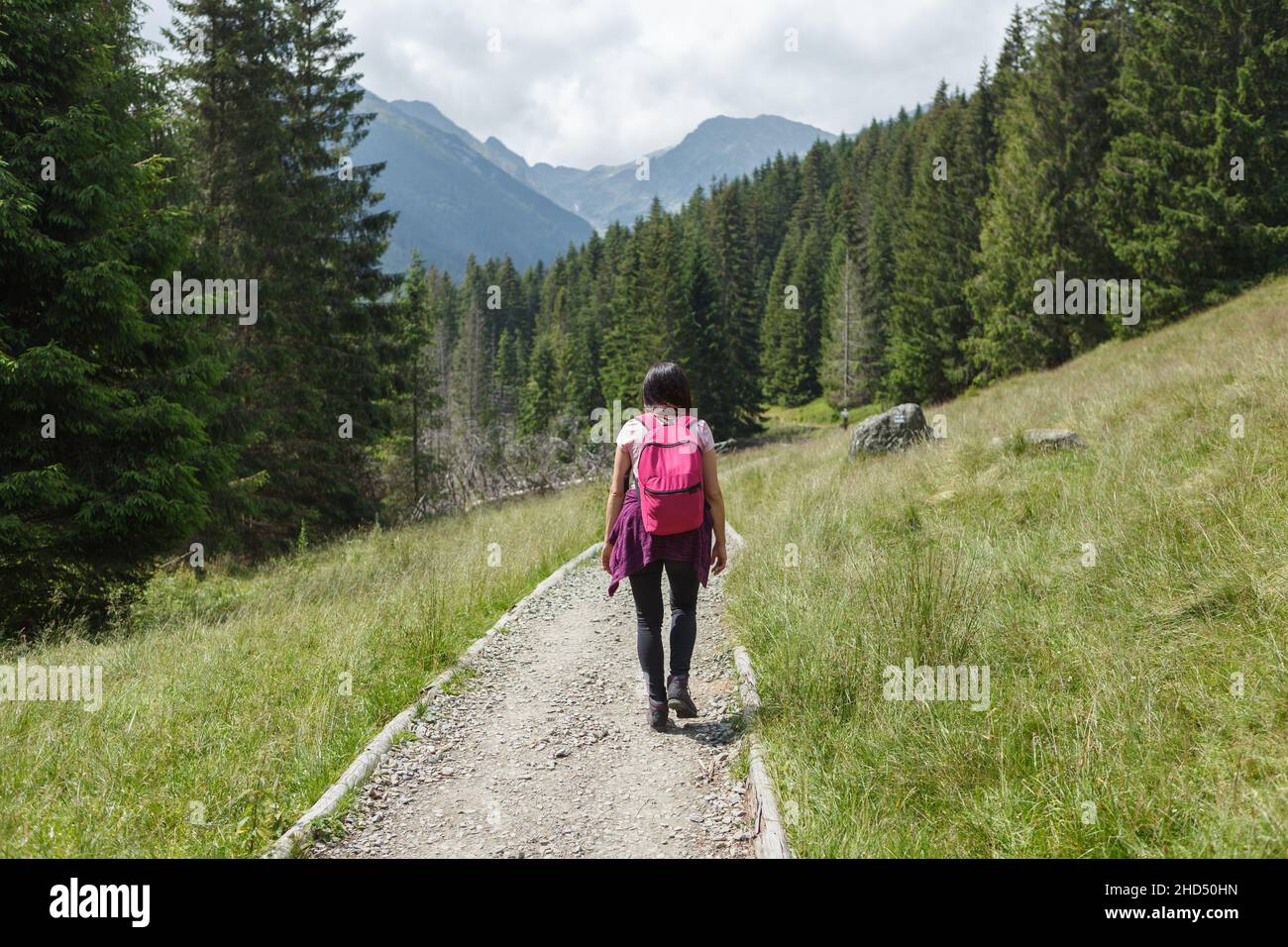Girl pink backpack rear hi-res stock photography and images - Alamy