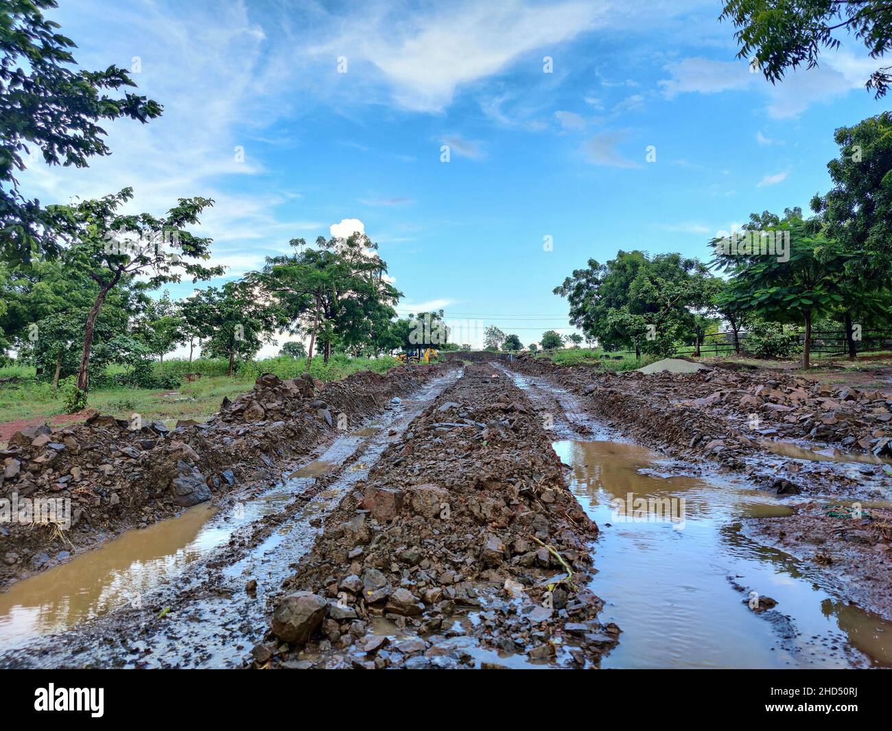Stock photo of messy muddy dirt road after heavy rain with deep tire ...