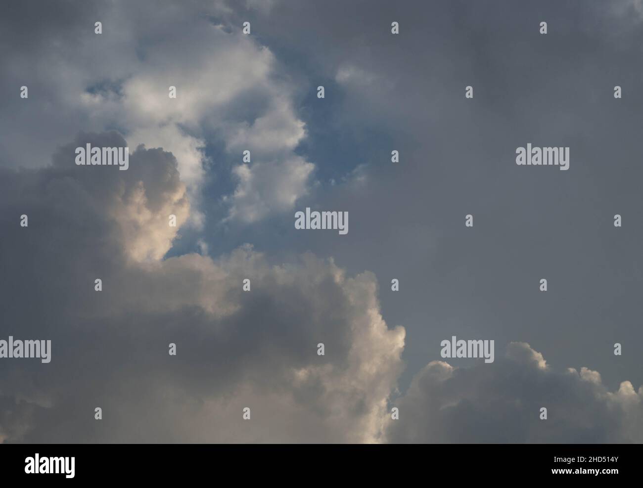 cloudy sky in summer with sun rays background Stock Photo - Alamy