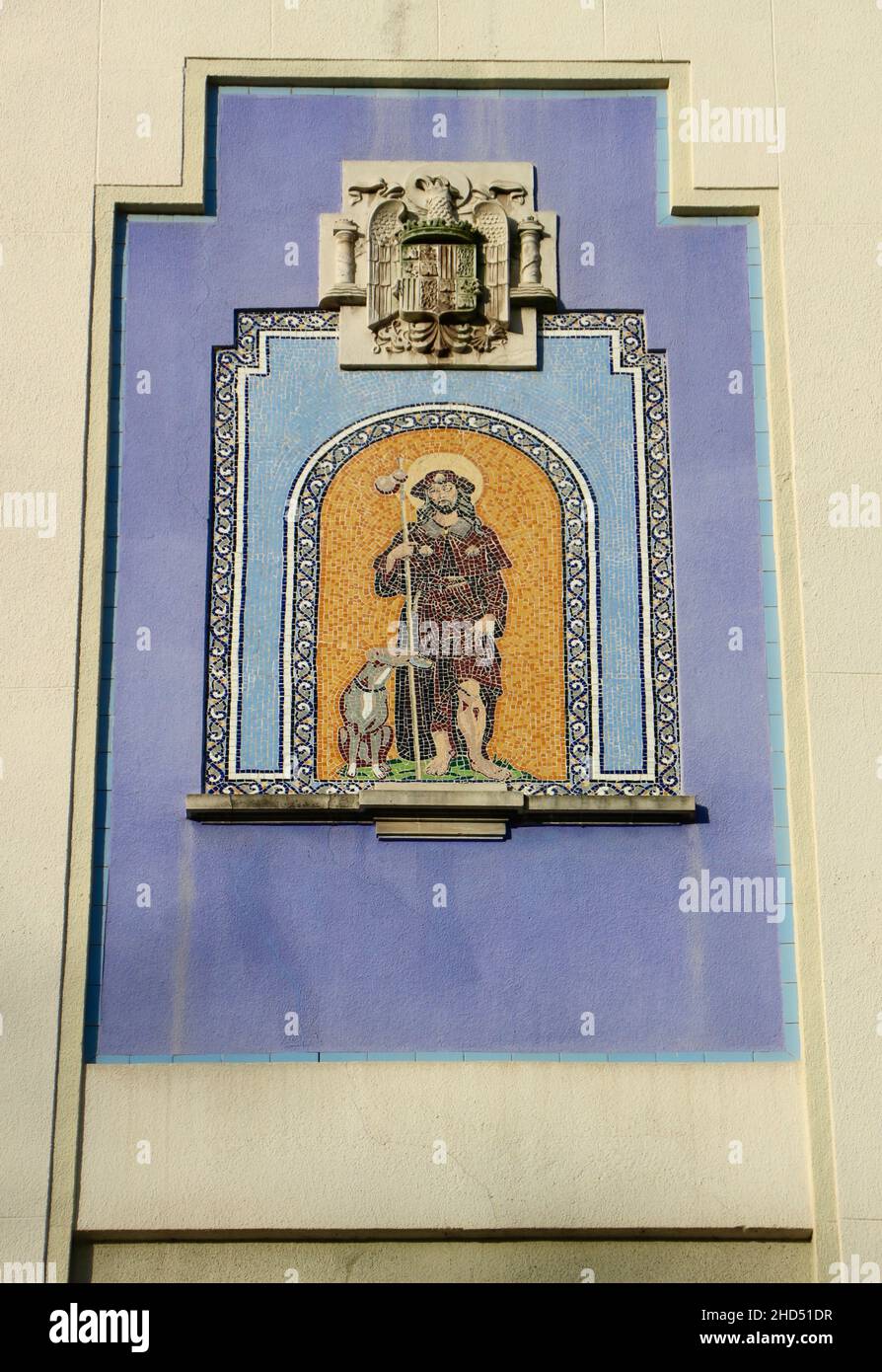 Close up of a mosaic tile illustration over the entrance to Saint Roch ...