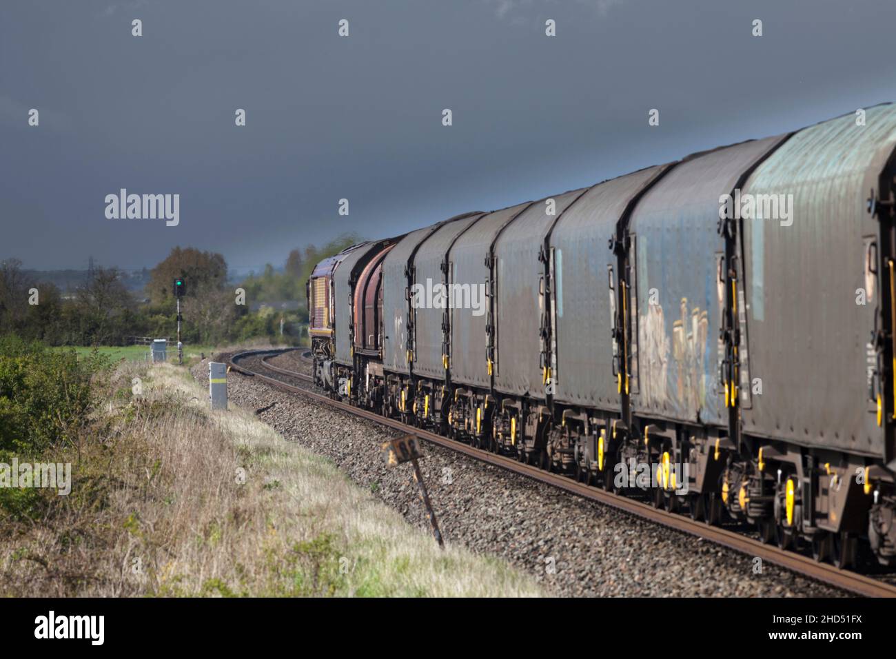 Freight train approaching a green or clear railway signal at Stoke ...