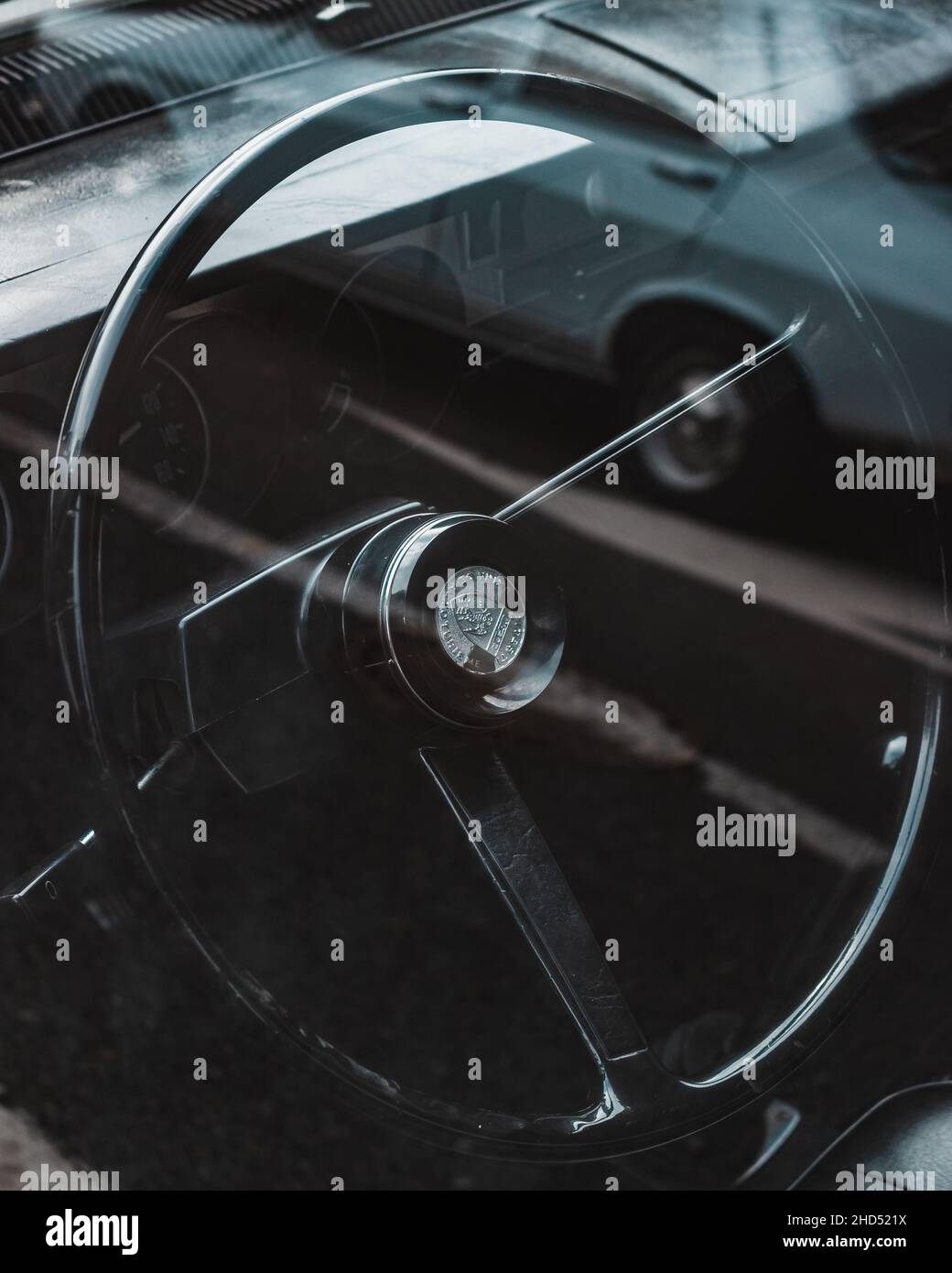 Steering wheel and dashboard of an old Dacia 1300 captured through the ...