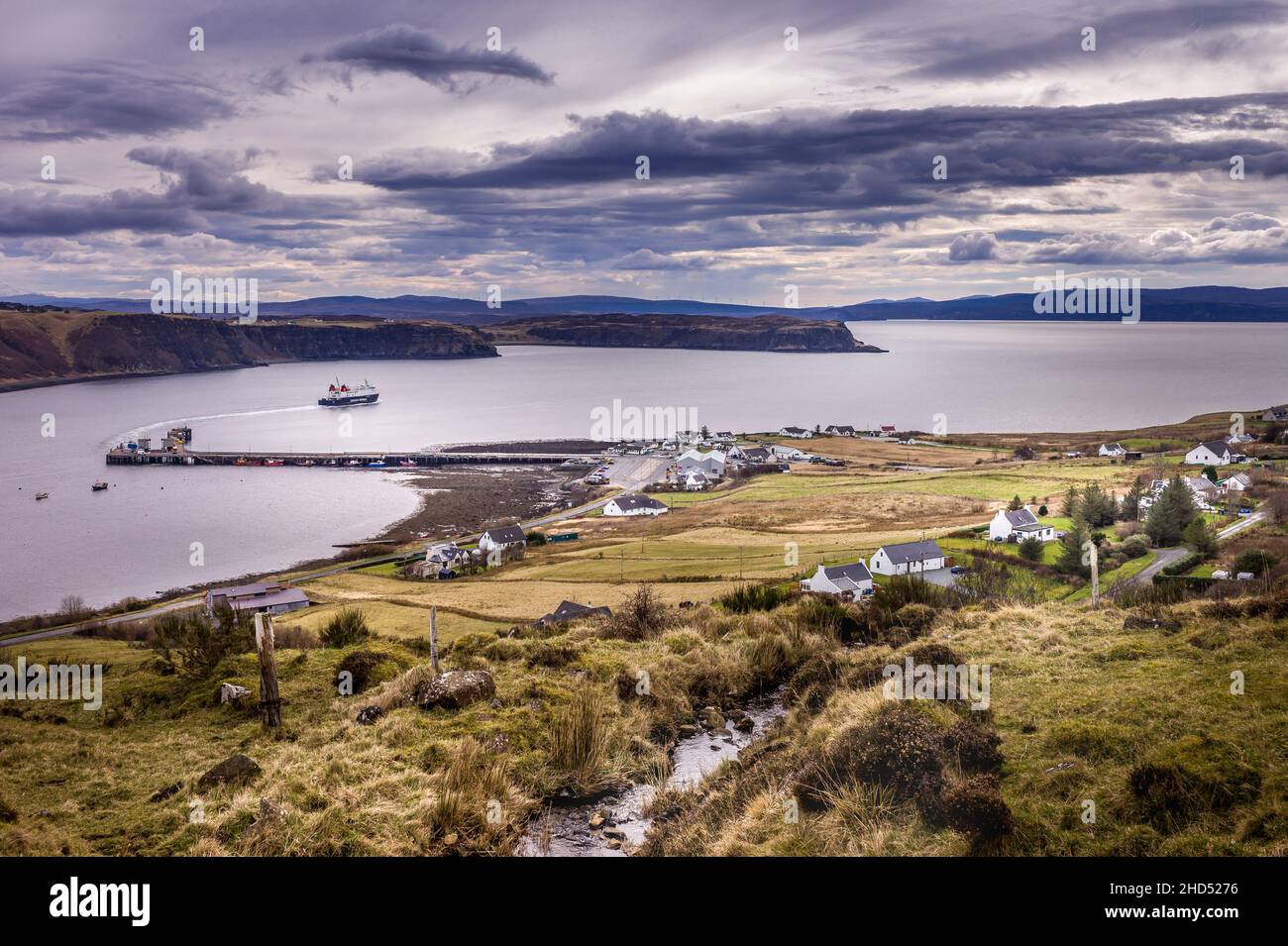 A Caledonian MacBrayne ferry leaving the port of Uig on the Isle of ...