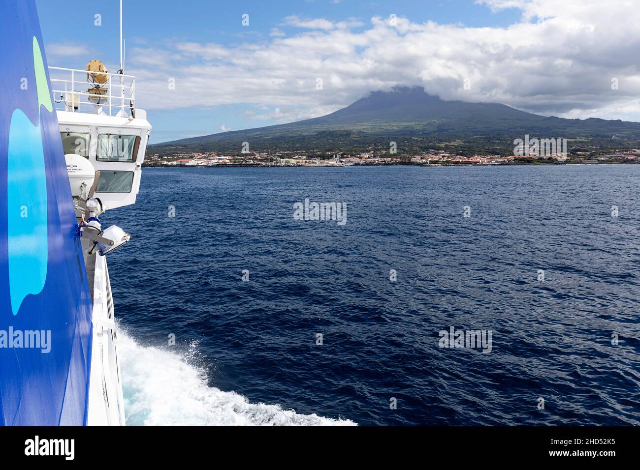 Ferry from Faial to Pico, view from ferry boat to Mount Pico and town ...