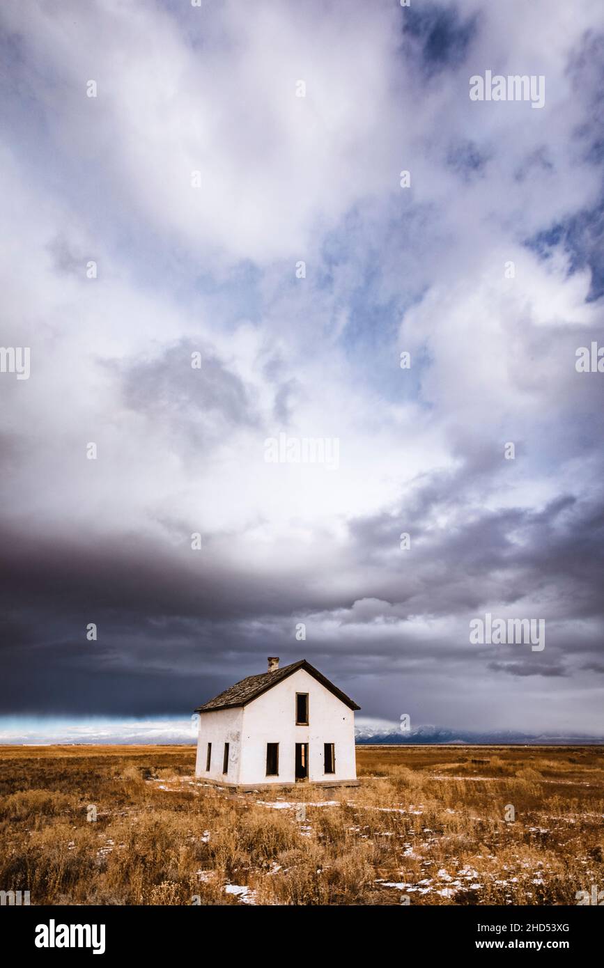 Abandoned house in lonely isolated desert with clouds, Colorado Stock ...