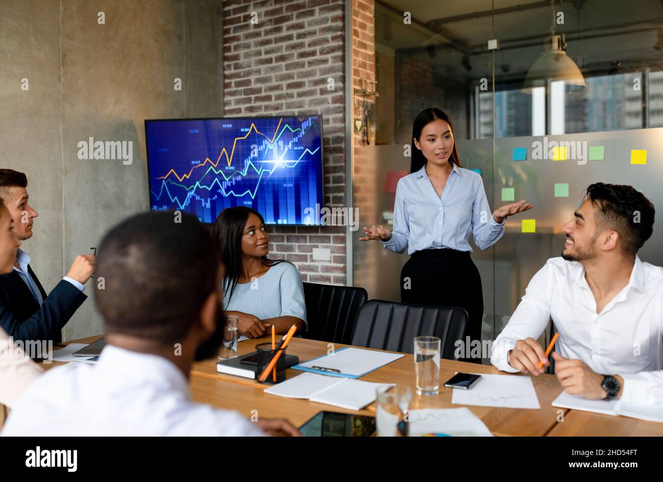 Multiethnic Group Of Business People Communicating During Corporate ...