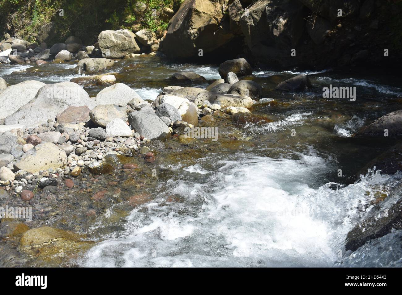 Beautiful photo of the river flowing among rocks Stock Photo - Alamy