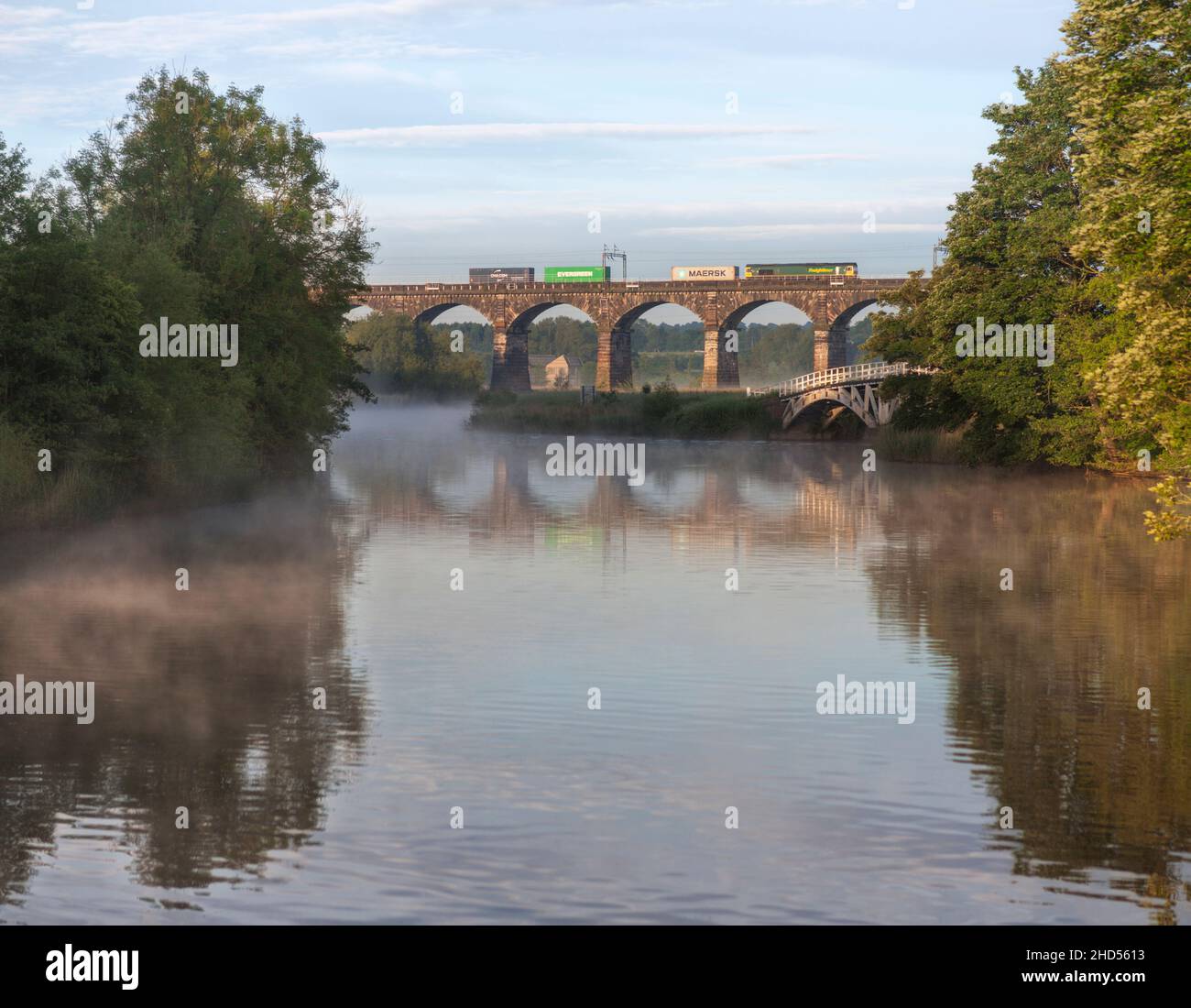 Freightliner class 66 diesel locomotive crossing Dutton viaduct on the ...